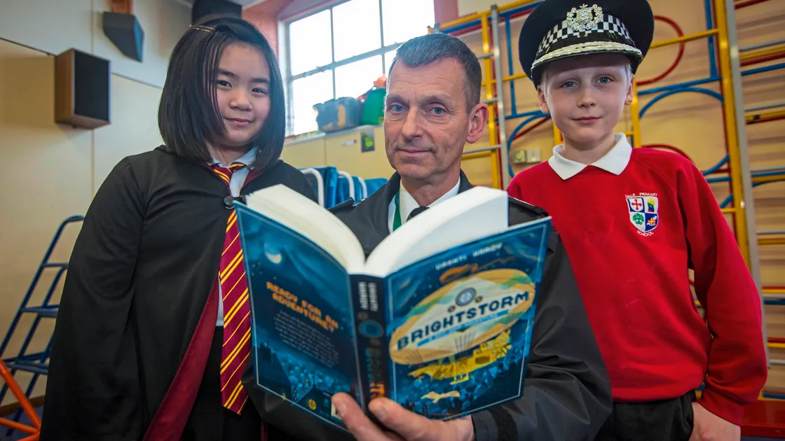 Island personalities read to Vale pupils