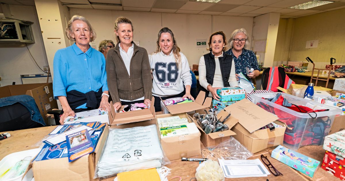 Lady Cripwell and team help to pack shoeboxes