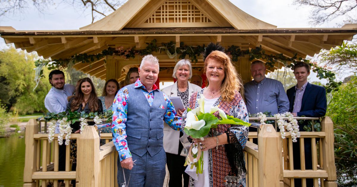 Restored park pavilion used for couple’s quiet wedding