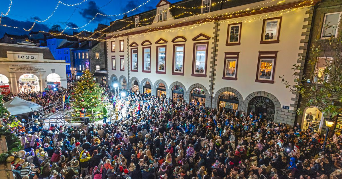 Santa Claus brings light and cheer to St Peter Port