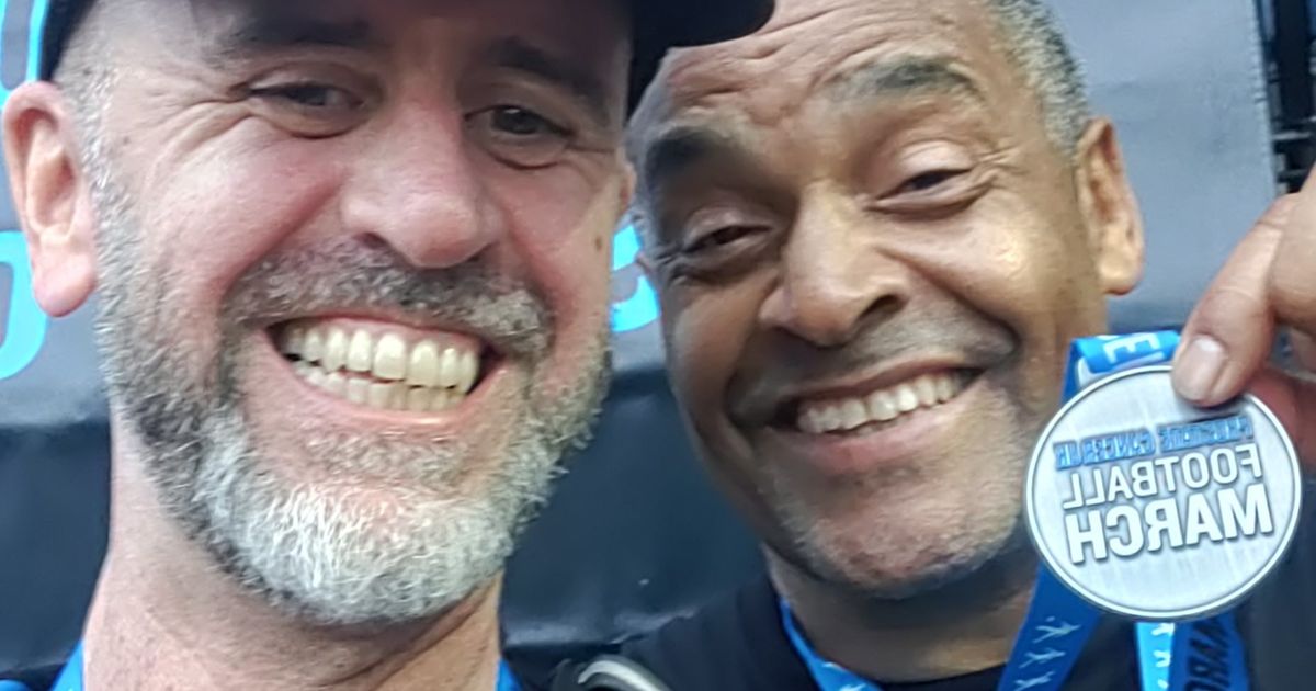 Prostate cancer survivor joins in charity football march