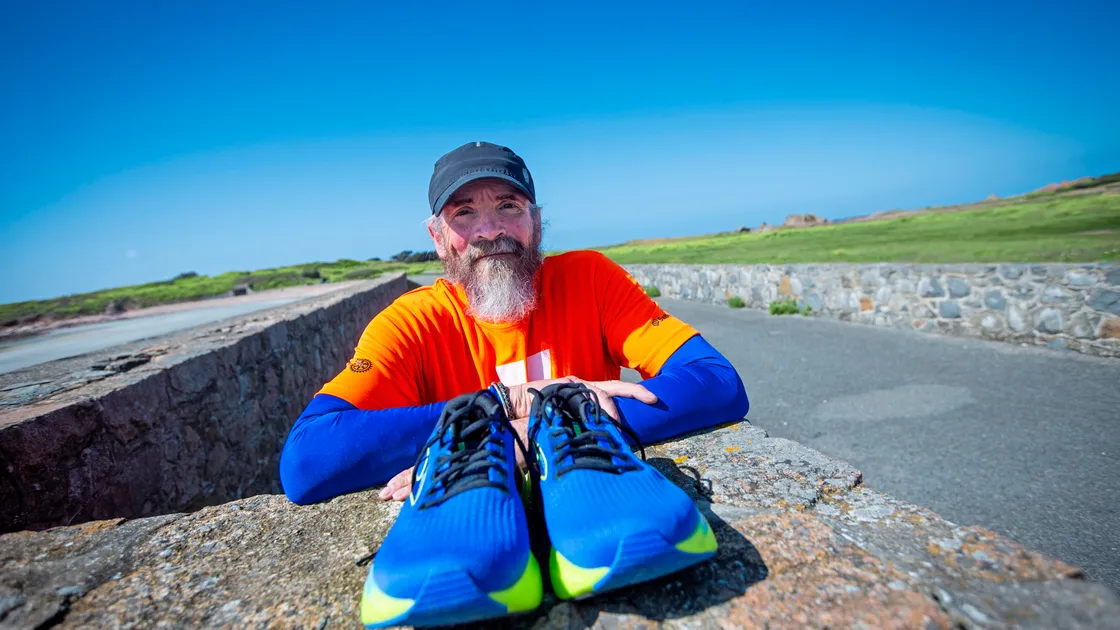 Charity walker begins three-lap trek of island