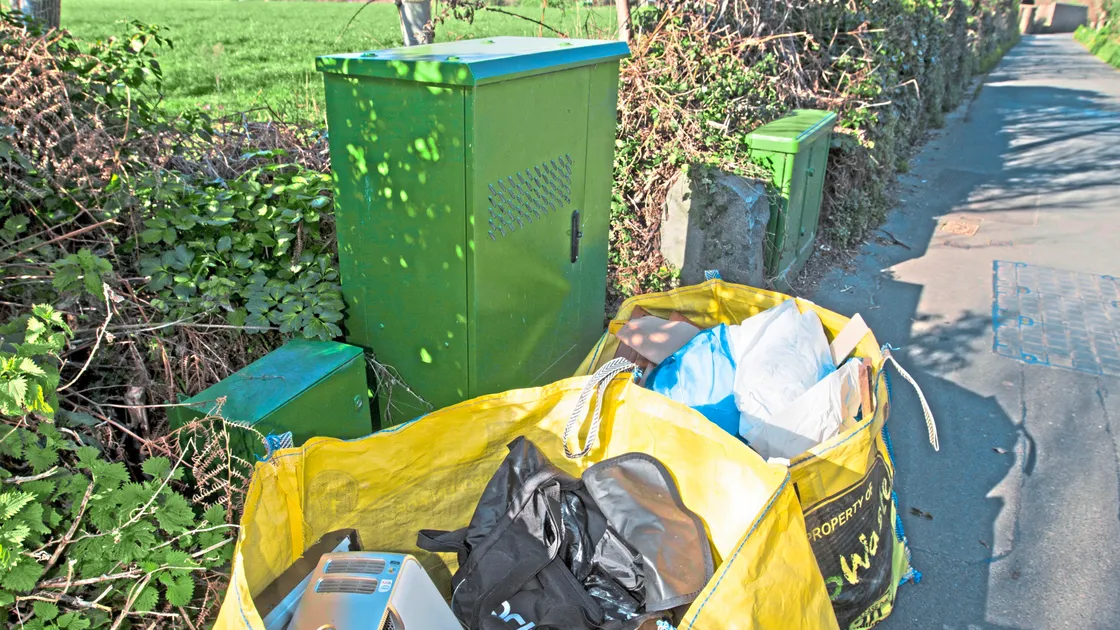 Castel fly-tipping includes suitcases and computer
