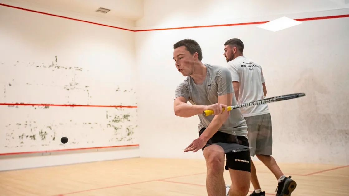 Champion Radford battles through two epic matches