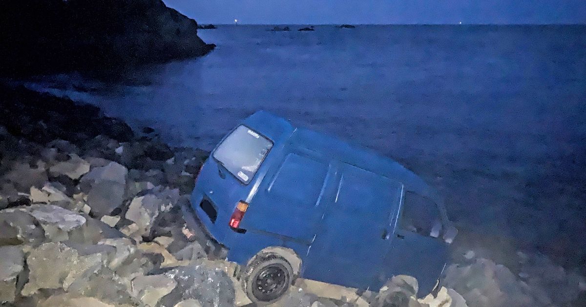 Emergency services called to van stuck on rocks last night