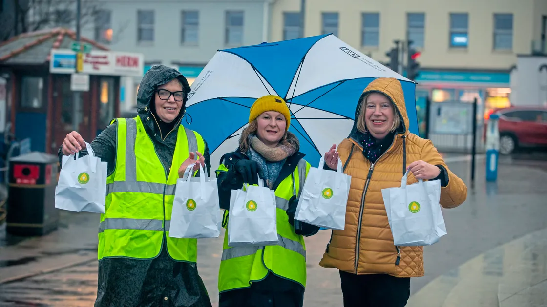 Bowel Cancer Guernsey handing out porridge